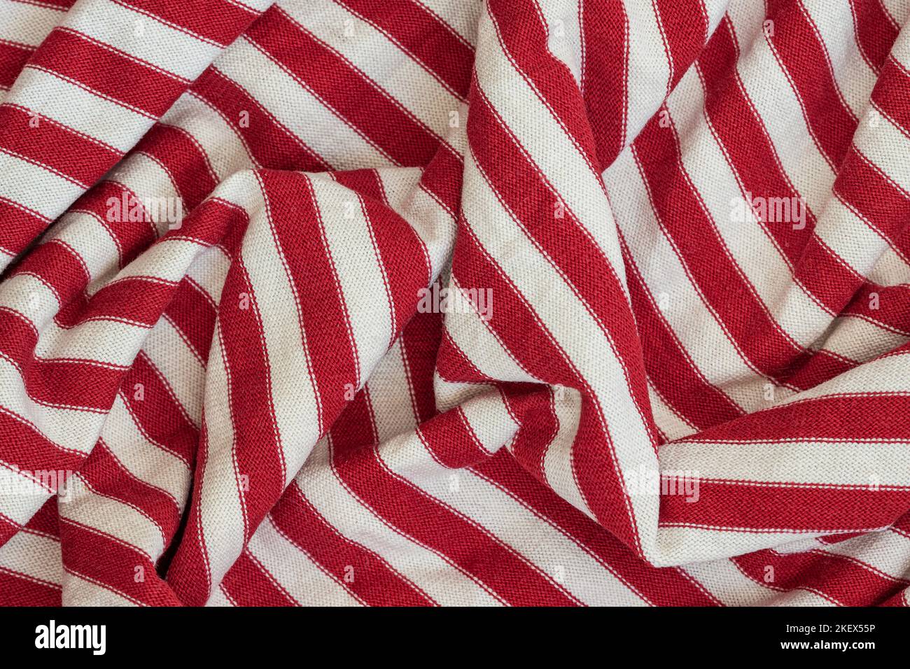 Textile texture closeup, abstract background. Red - white striped color ...