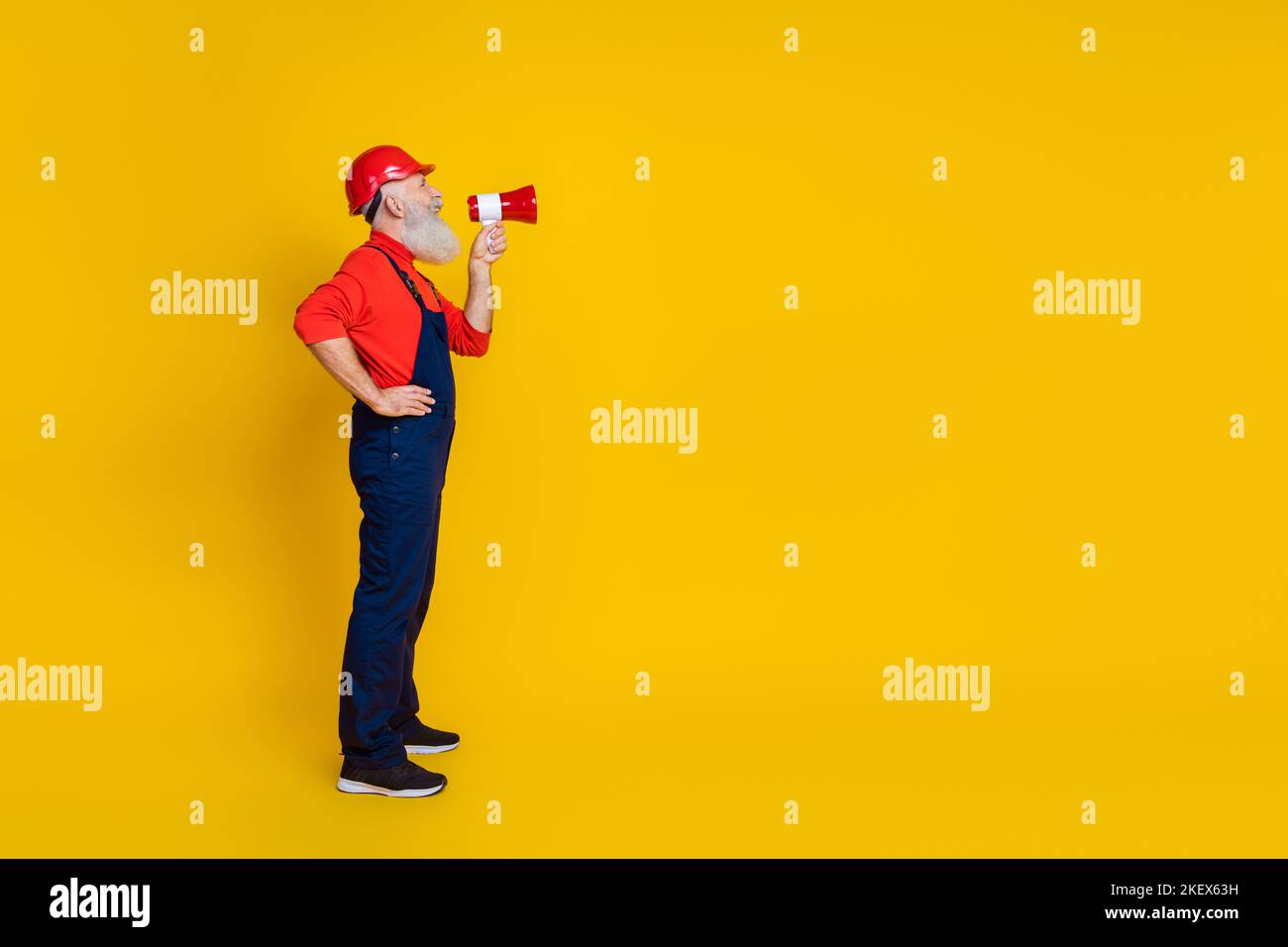 Profile side full body photo of professional retired technician ...