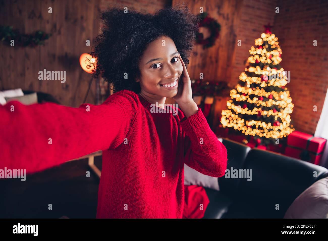 Photo of pretty cute modest child teenager hand cheek recording video ...