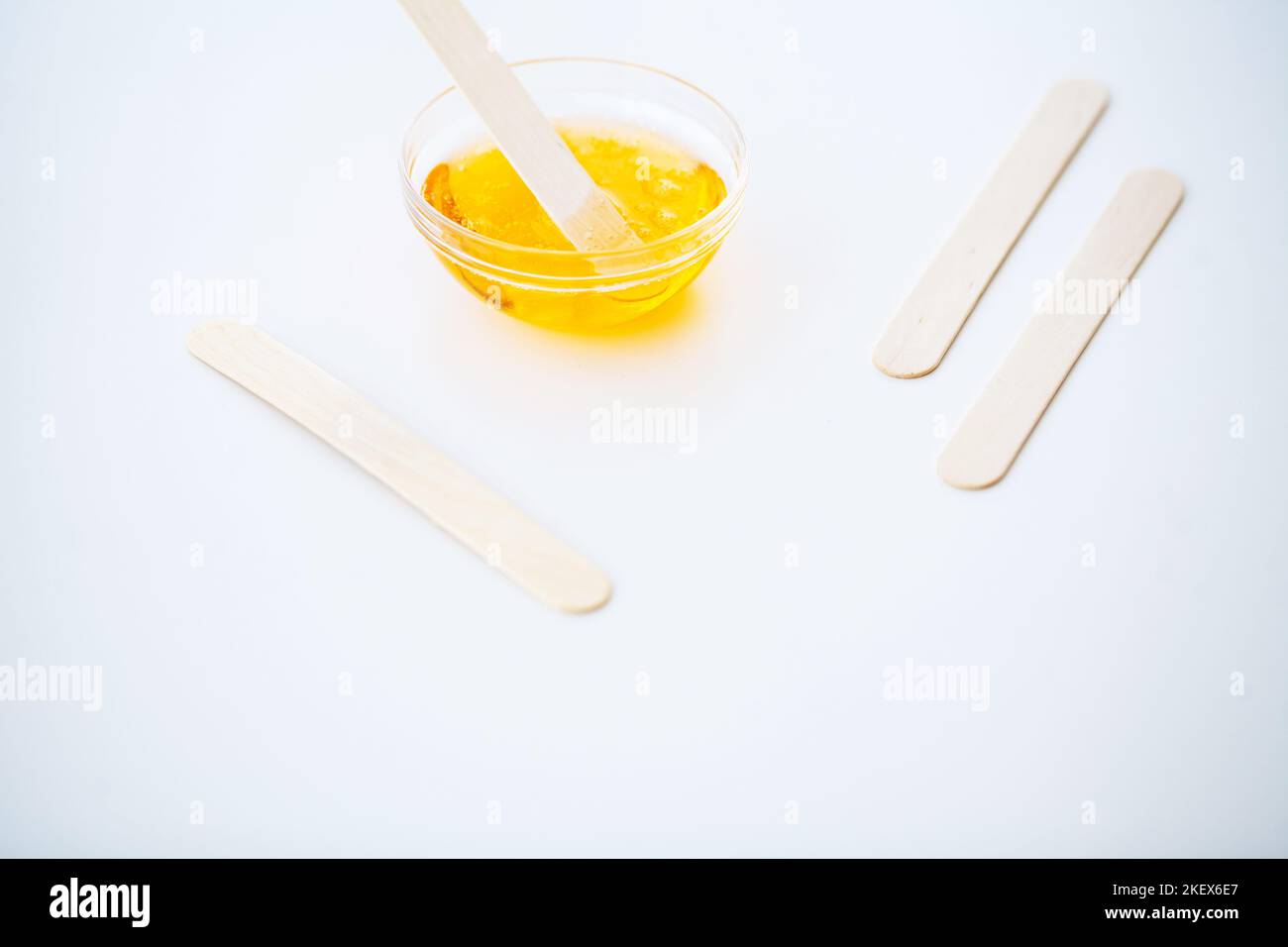 Waxing. Paste for sugaring in beauty salon. Concept depilation with wax ...