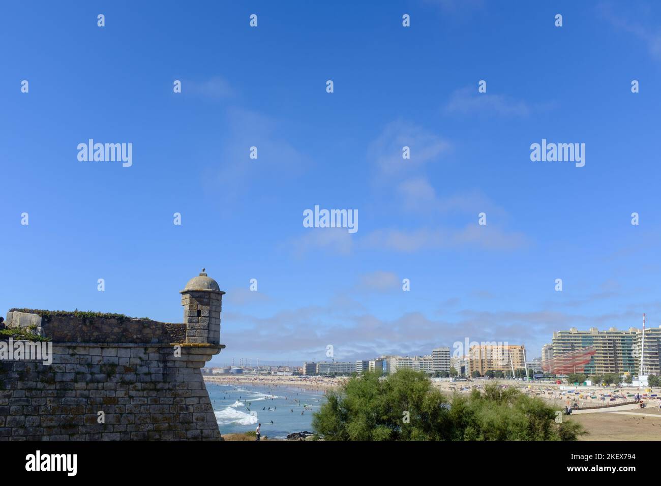 Medieval tower castle landmark at the edge of the Atlantic Ocean on a ...
