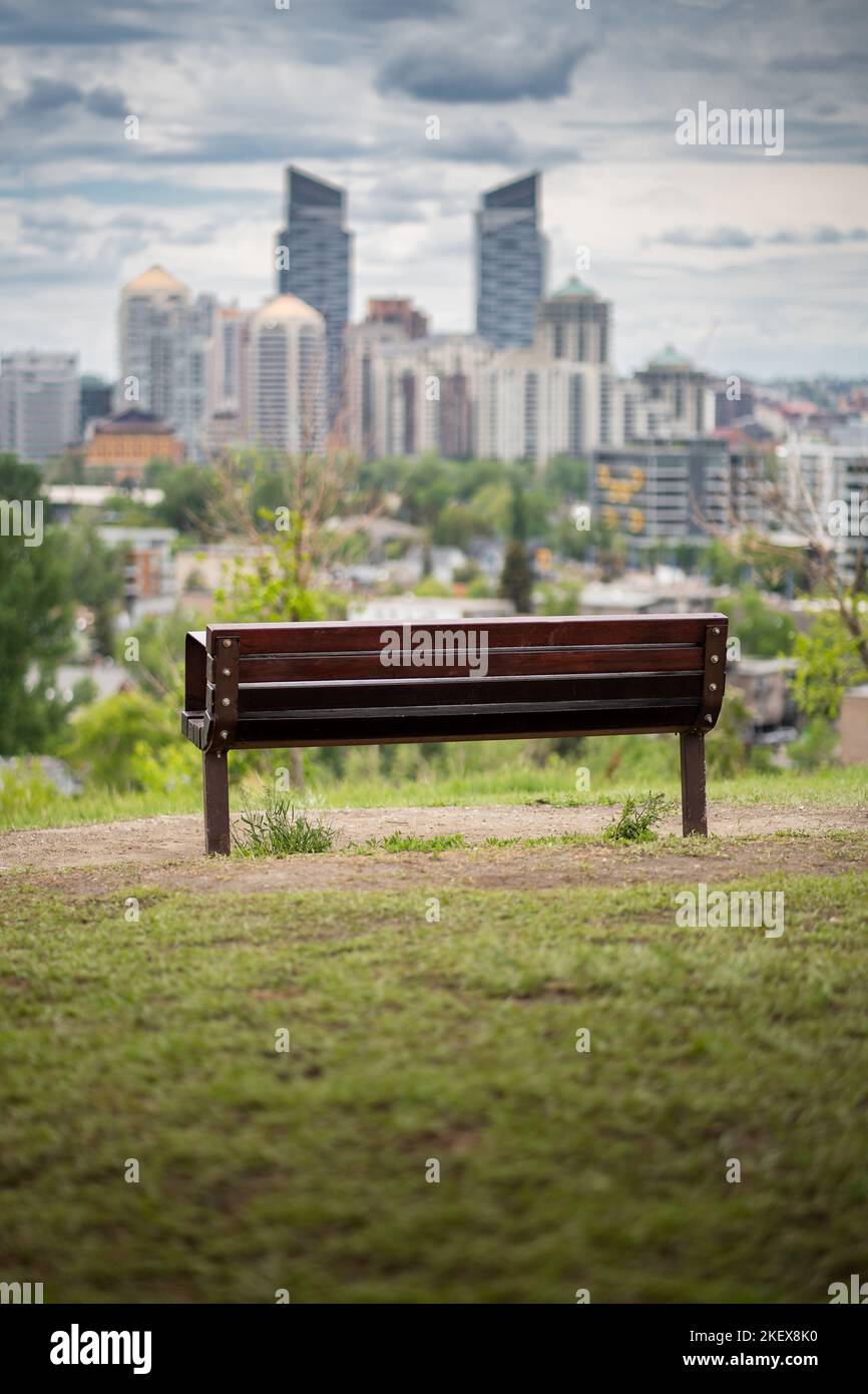 A park bench overlooking the downtown Calgary skyline and popular ...