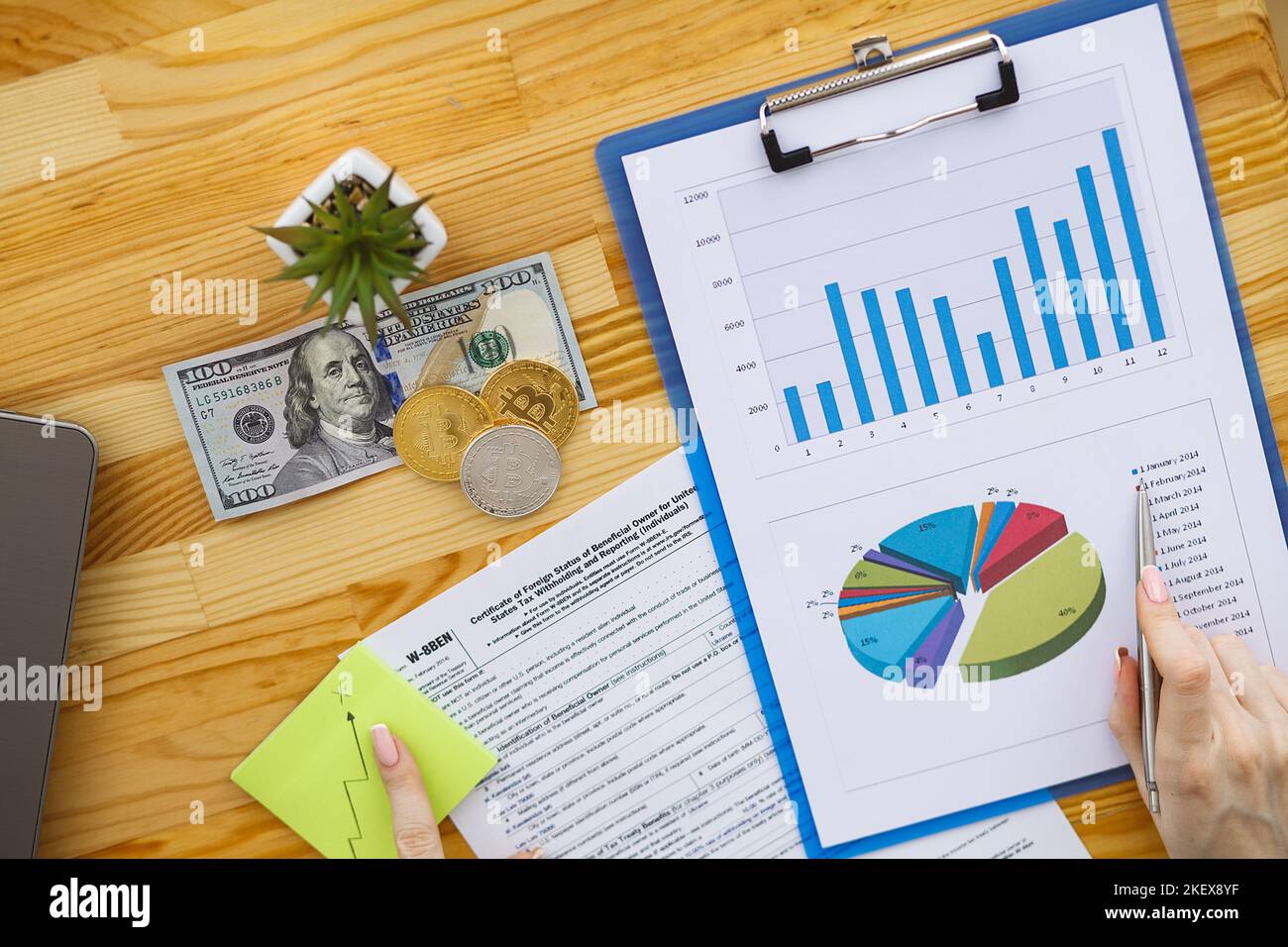 Office desk table with computer, supplies and plant Stock Photo - Alamy