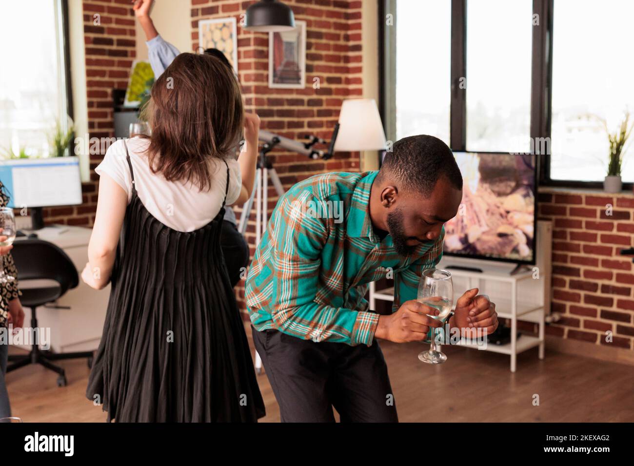 Multi diverse couple dancing, enjoying music, having fun at friends ...
