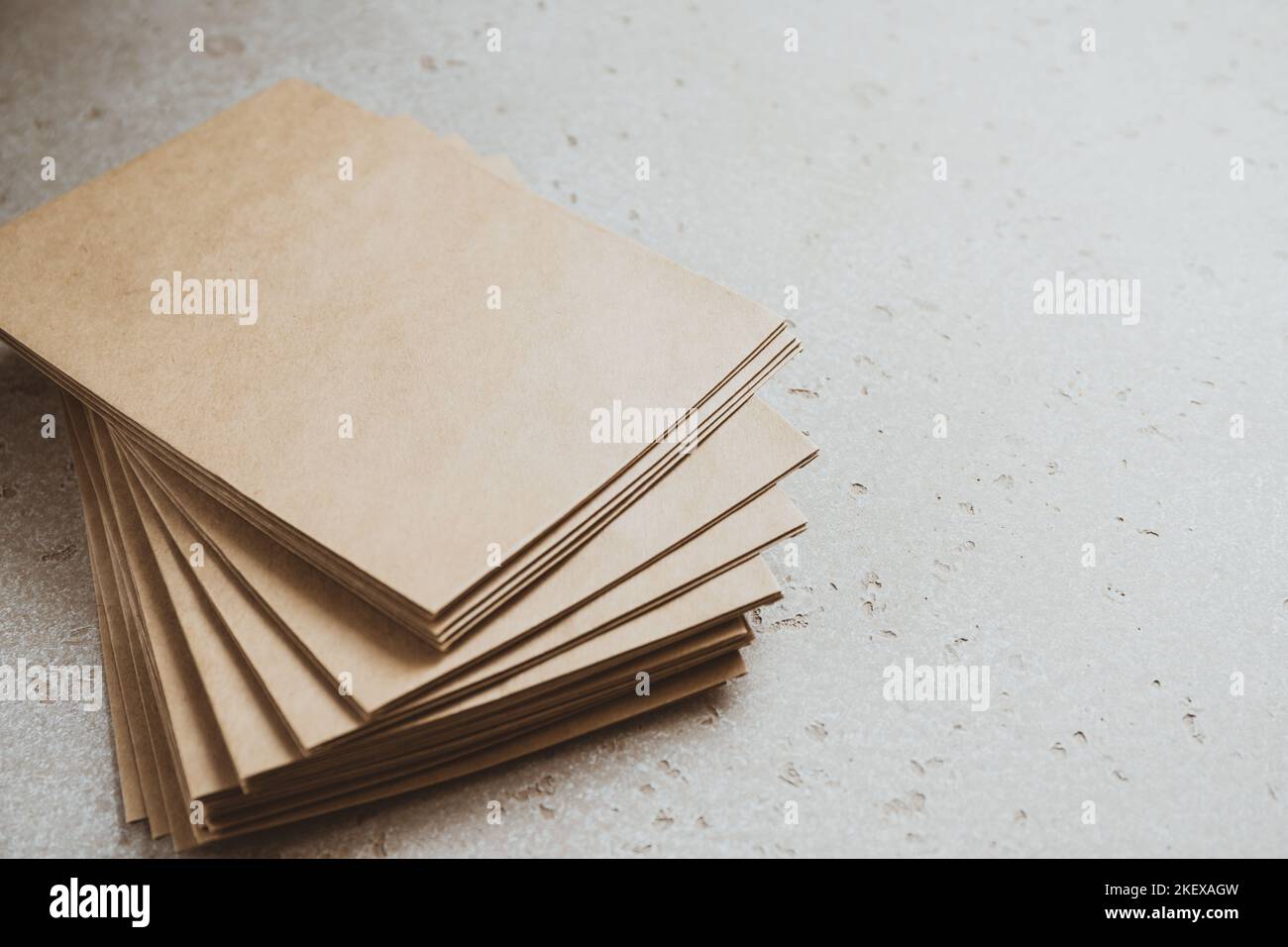A stack of craft paper envelopes on a table Stock Photo - Alamy