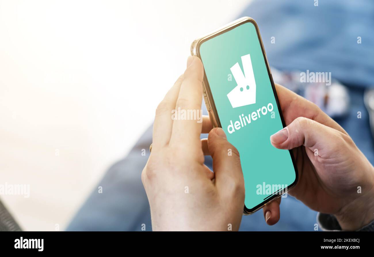 London, UK, Nov 2022: Female hands hold a smart-phone with the ...