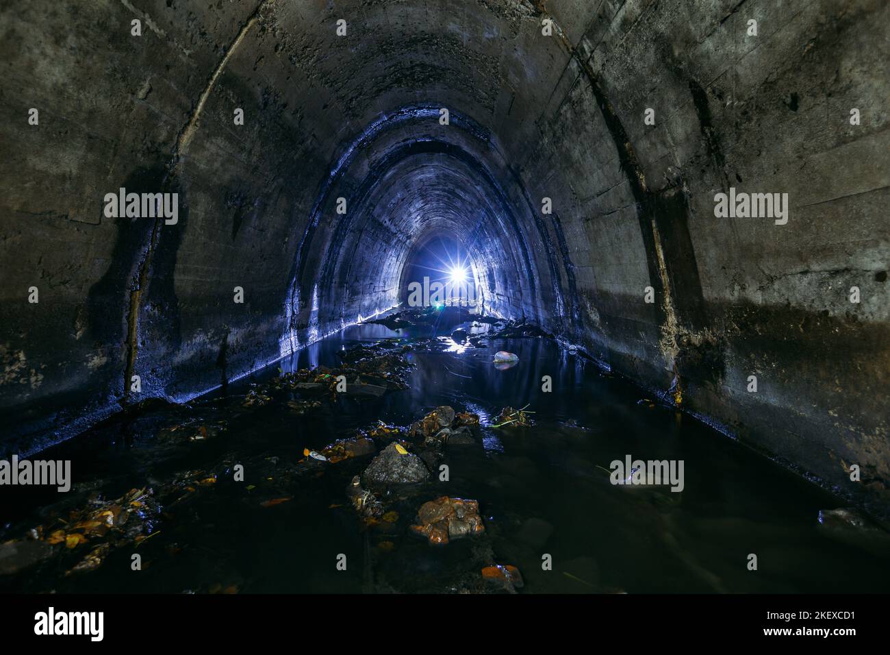 Undergound urban sewer tunnel. Large sewage collector Stock Photo - Alamy