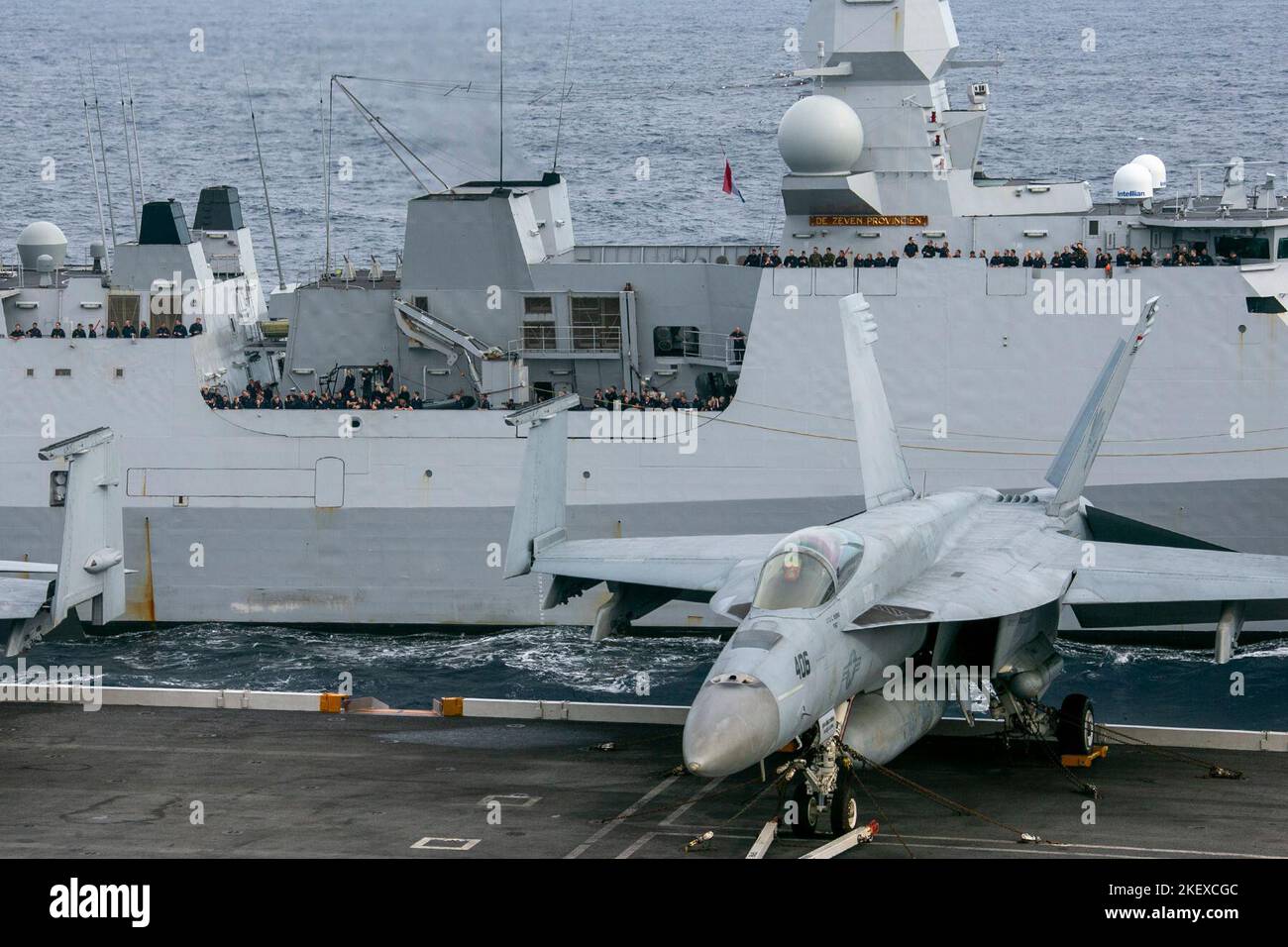 Sailors onboard Dutch frigate HNLMS De Zeven Provincien (F 802) observe ...