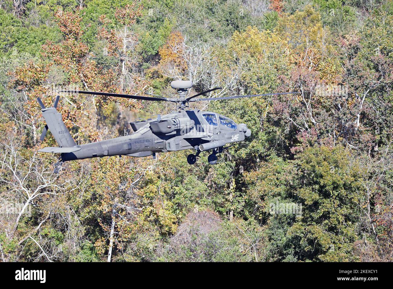 An AH-64E Apache Guardian helicopter conducts nap of the earth flight ...