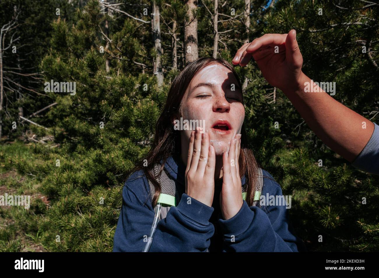 Teen girl sunscreen face hi-res stock photography and images - Alamy