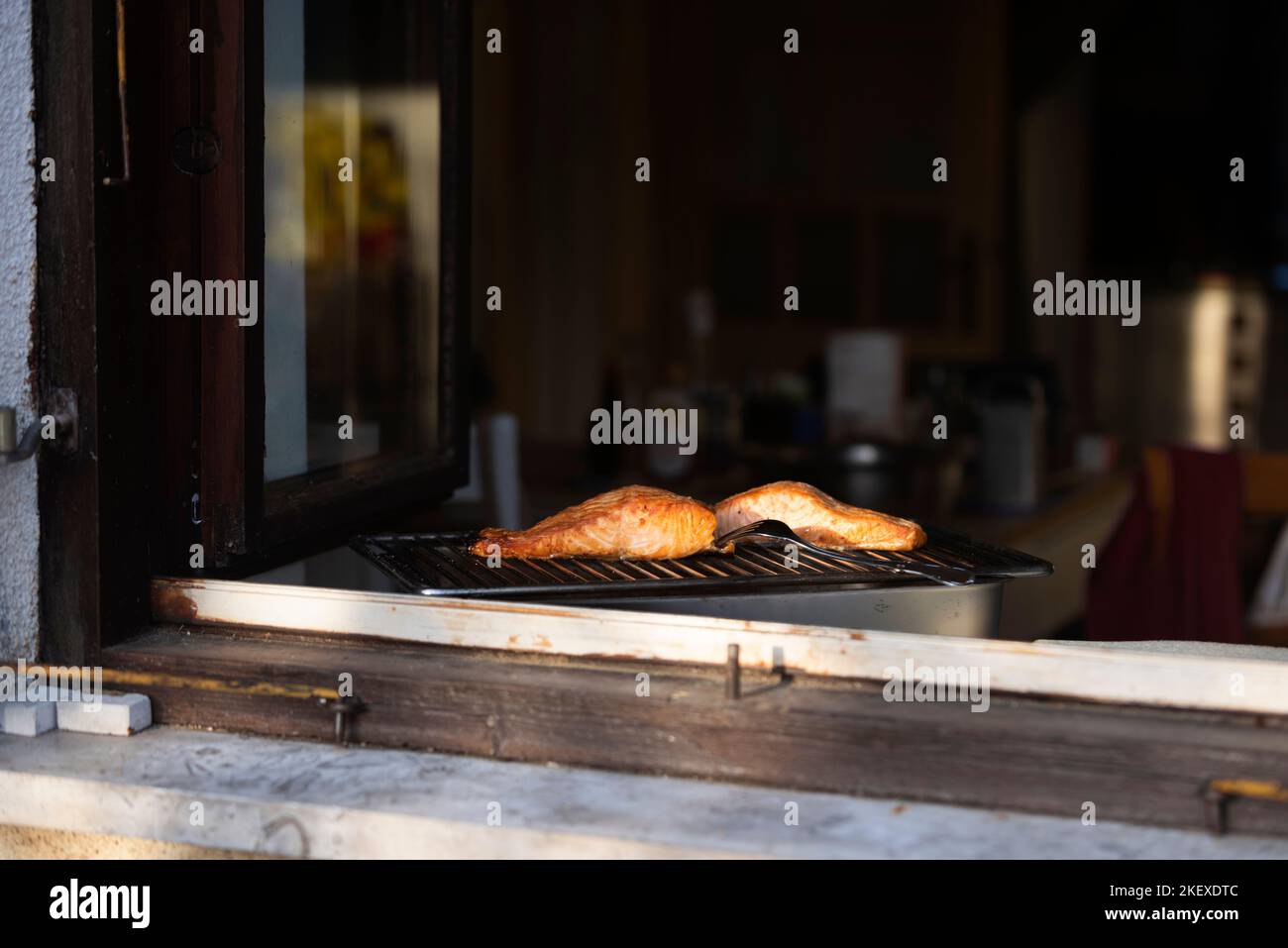 Delicious salmon fillet grilled in brick oven, on a windowsill Stock ...