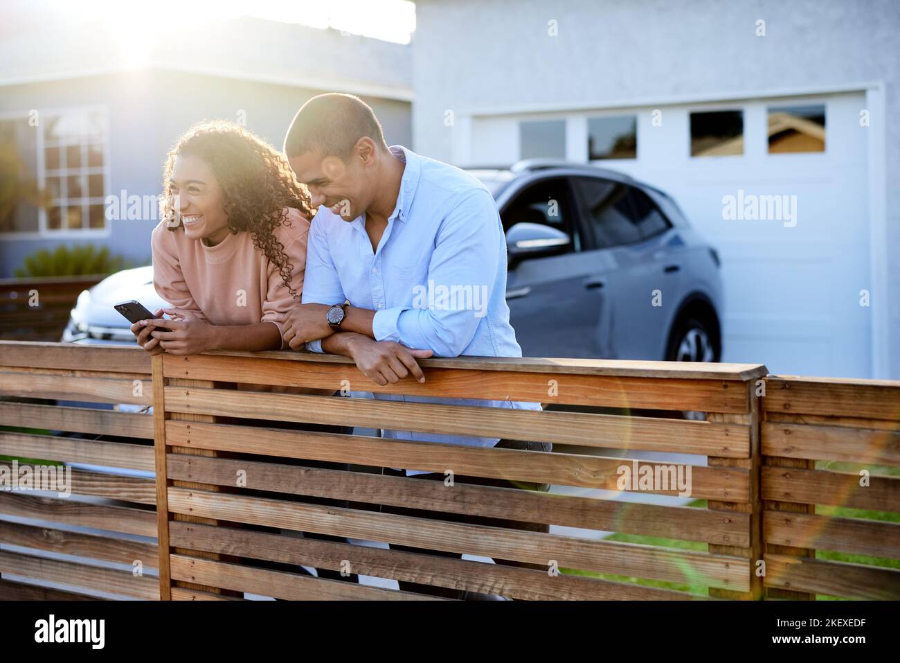 Couple leaning on railing hi-res stock photography and images - Alamy
