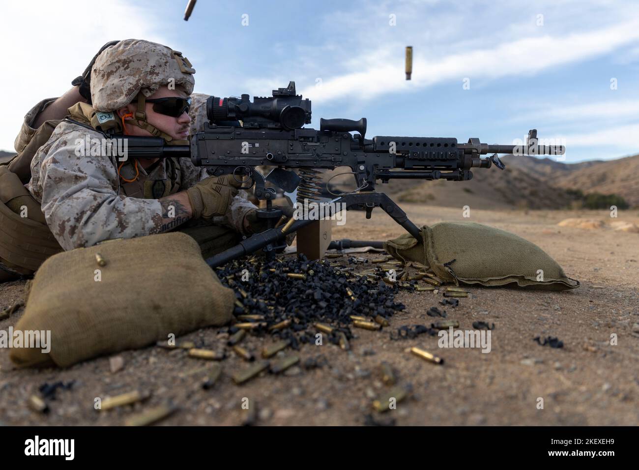 A U.S. Marine with 1st Radio Battalion, I Marine Expeditionary Force Information Group, fires an ...