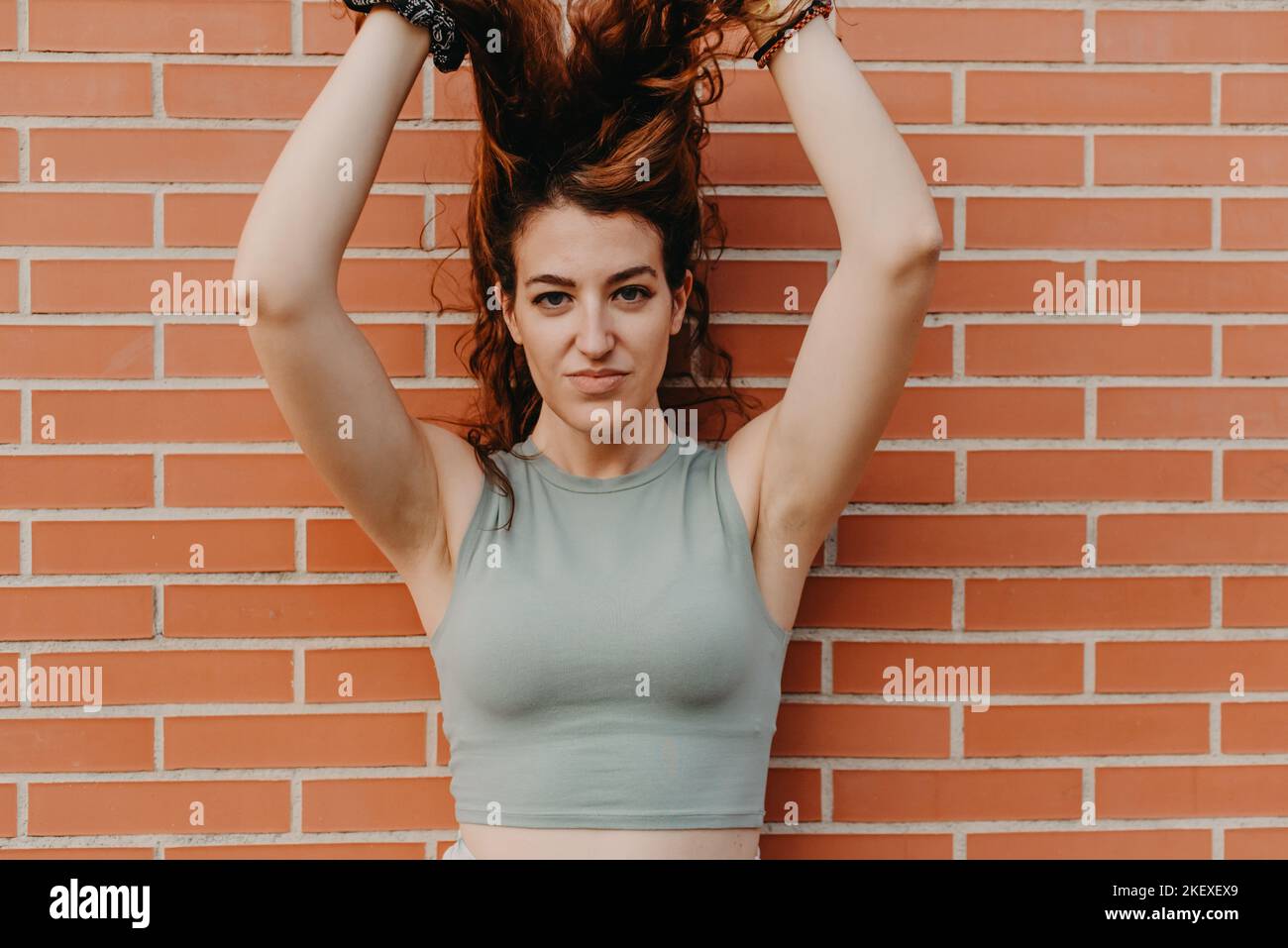 Young woman raising her hair. Hair loss Stock Photo - Alamy