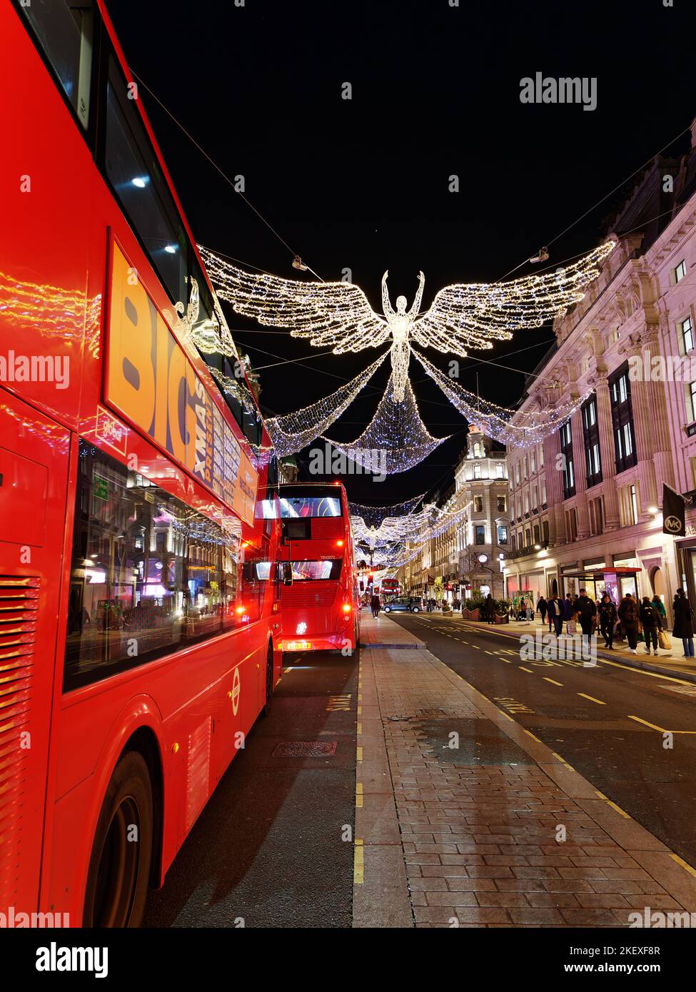 Spirit of Christmas aka Angels suspended over Regent Street as buses ...