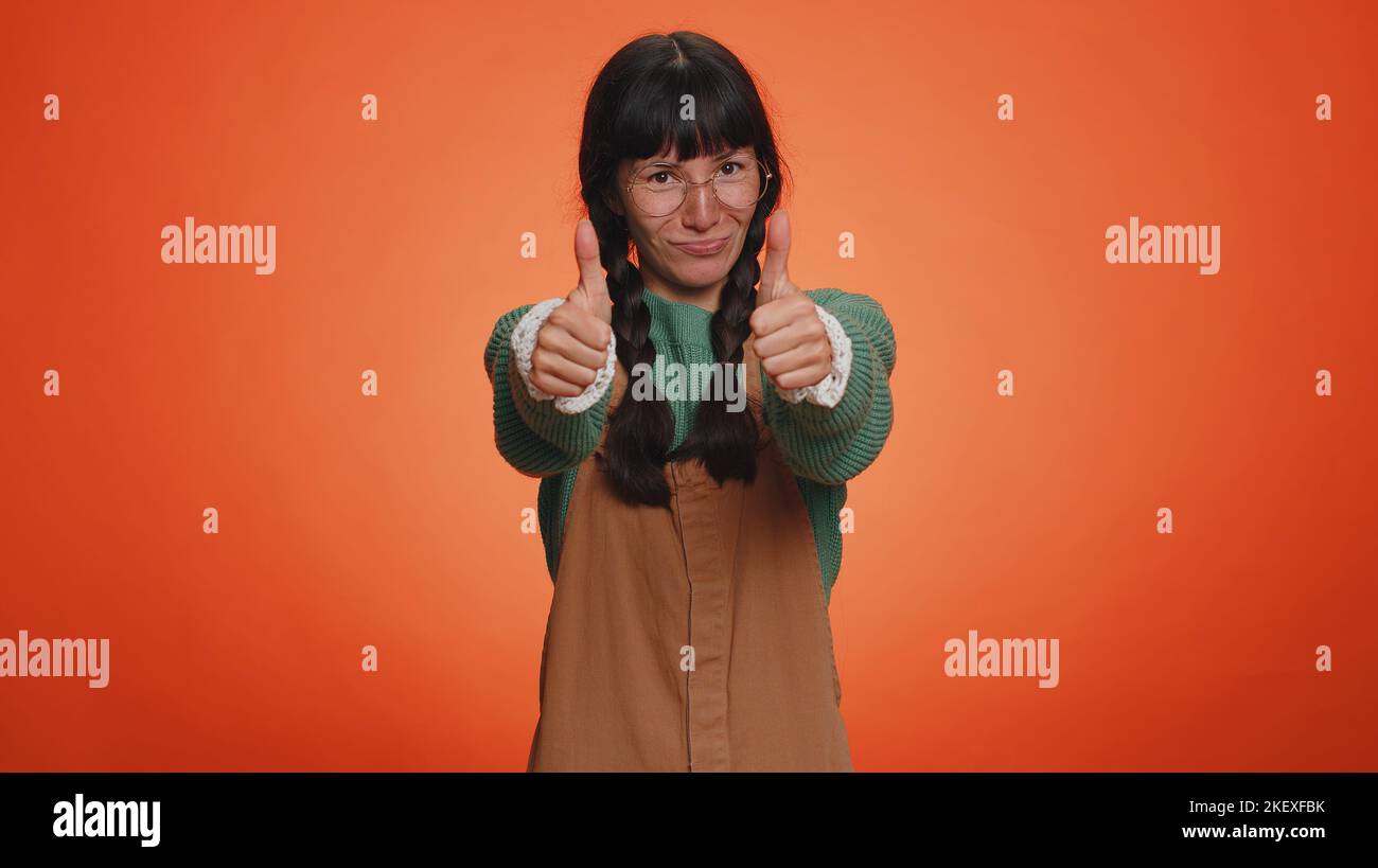 Great job, nice. Cheerful positive happy millennial woman in sweater ...