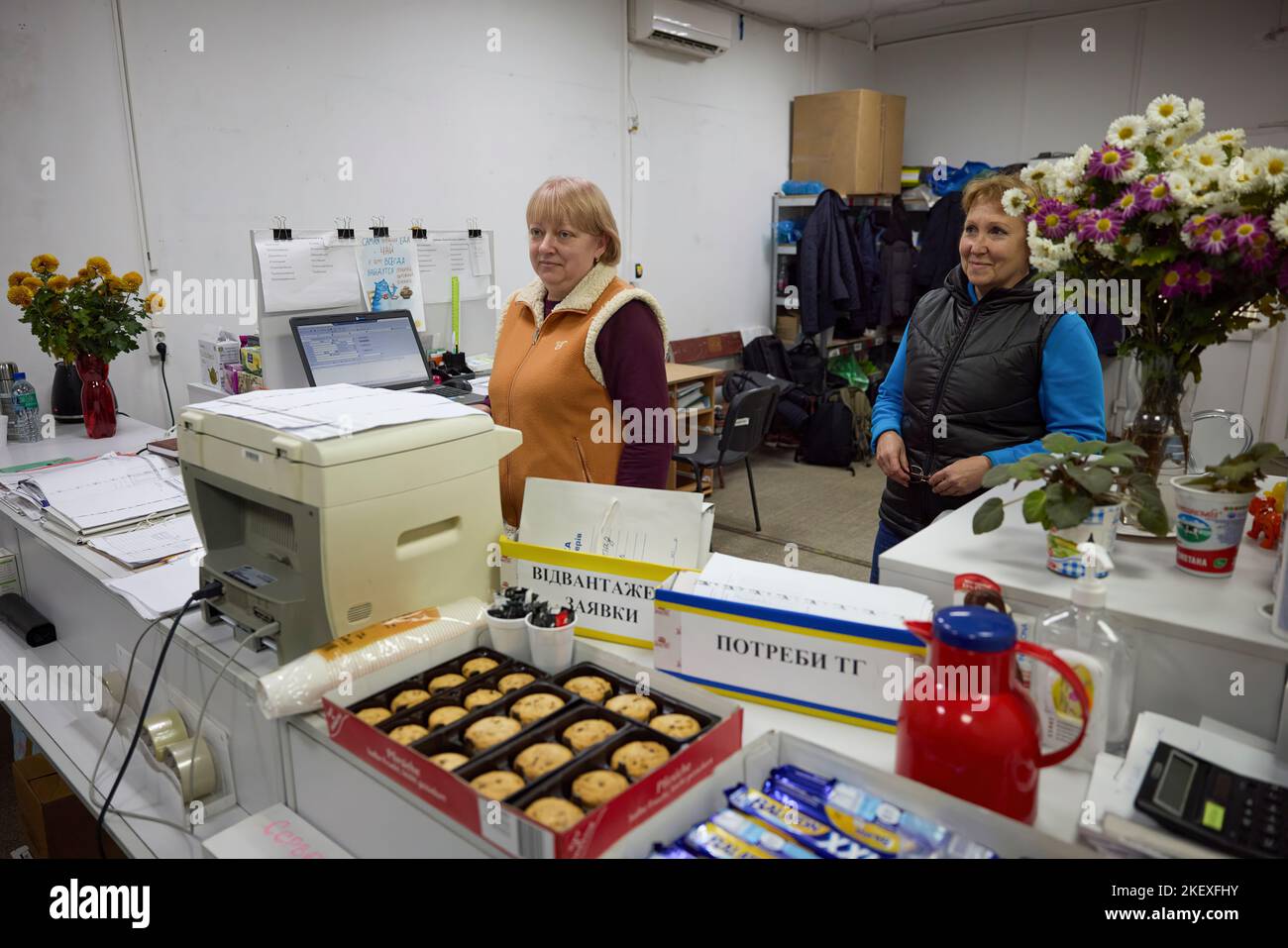 Ukraine President Volodymyr Zelensky visits an aid station and signs ...