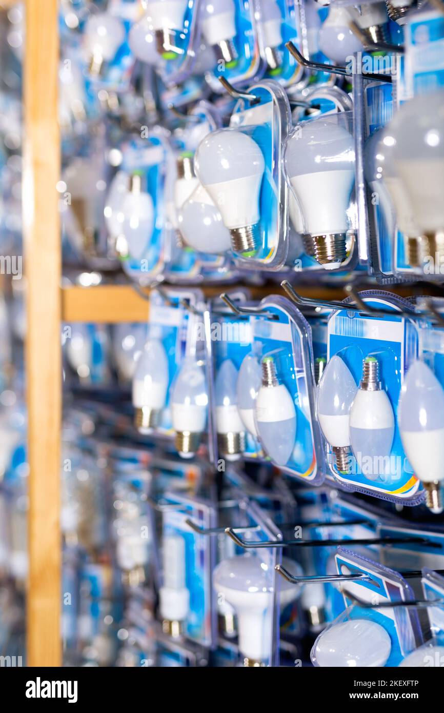 Light bulbs on display stand in household goods store Stock Photo - Alamy