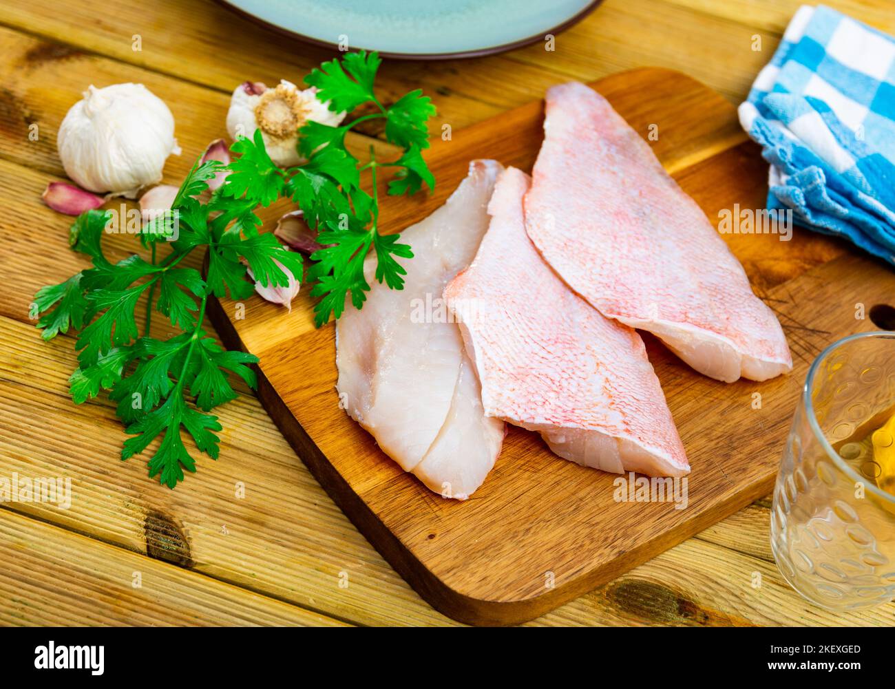 Fresh raw fillet of sea bass Stock Photo - Alamy