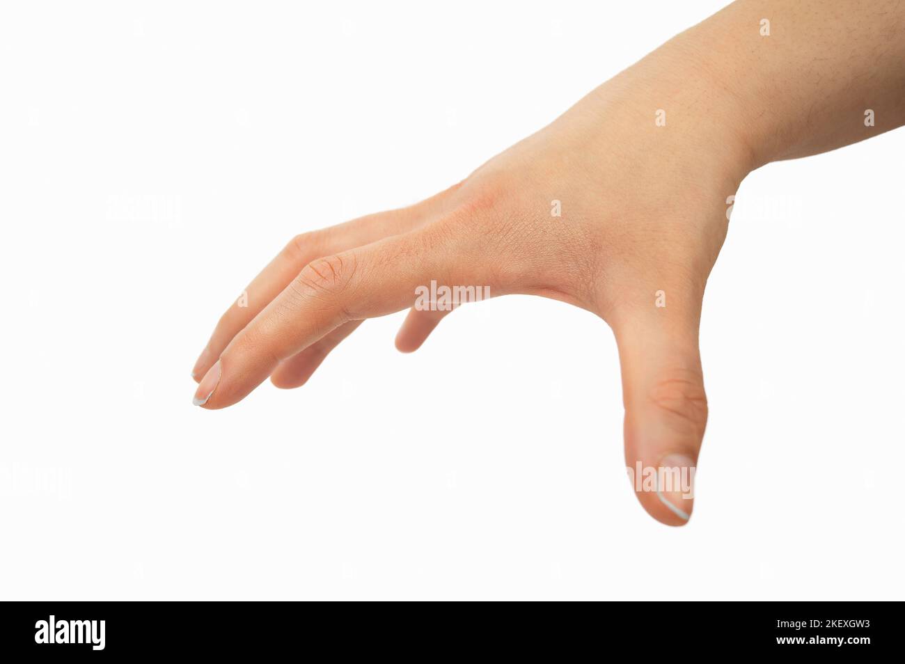 Woman hand hanging something isolated on a white background Stock Photo - Alamy