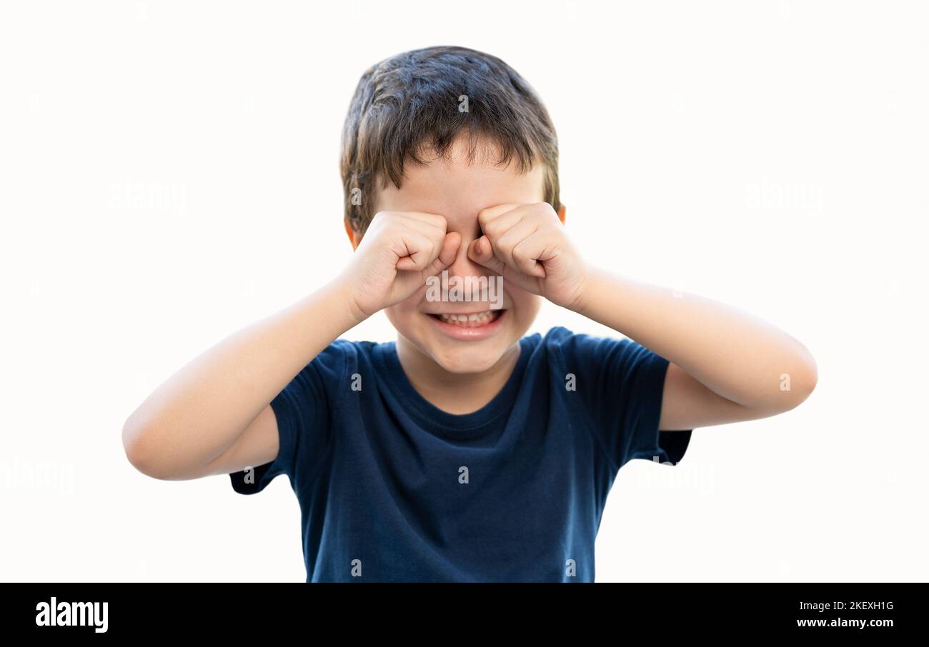 Young little boy kid wearing blue t-shirt standing over isolated white ...