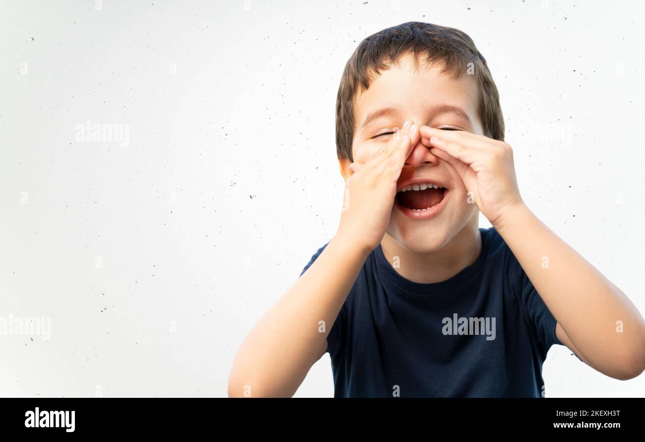 Child wearing blue casual t-shirt standing over isolated white ...