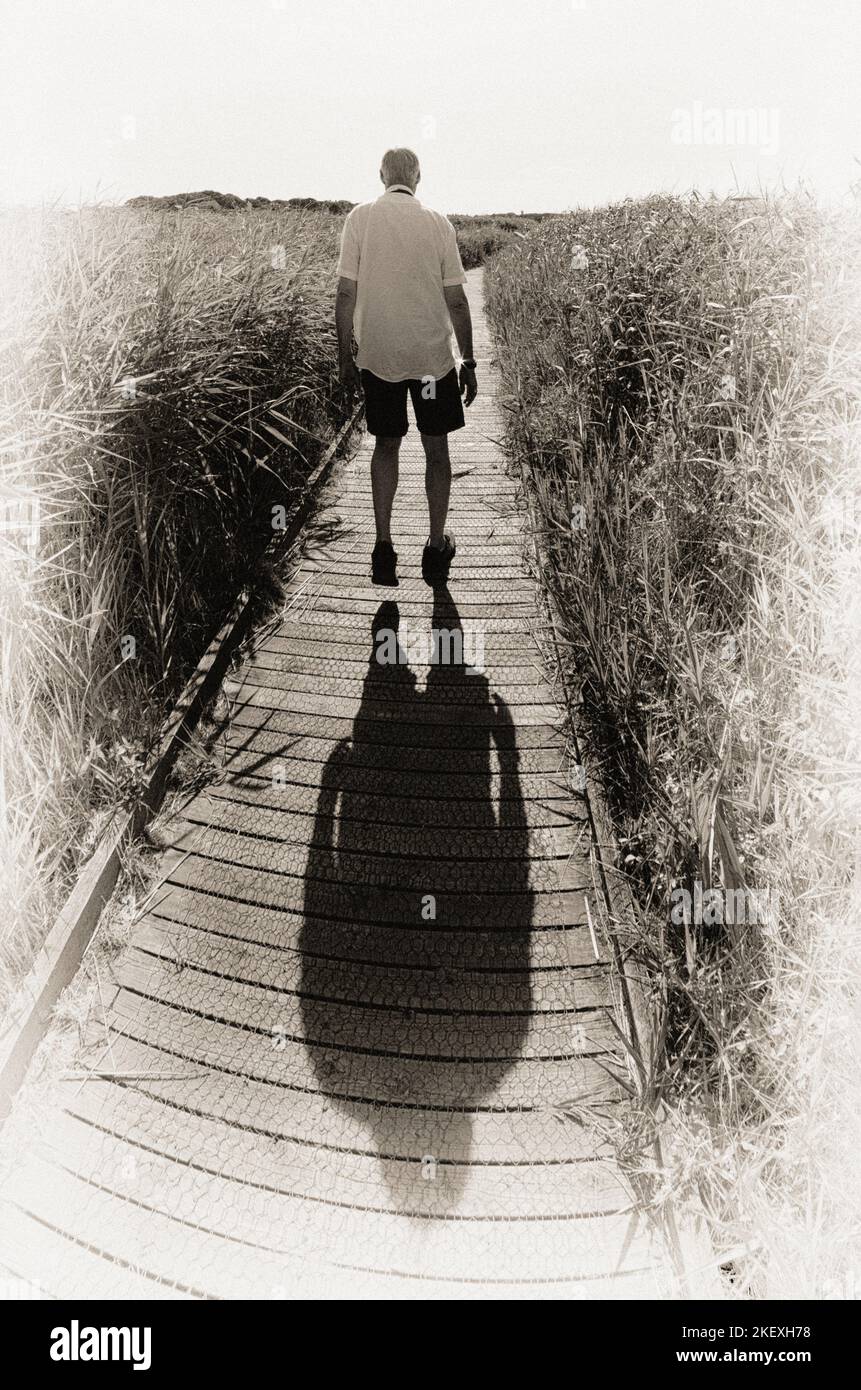 Man on a walkway hi-res stock photography and images - Alamy