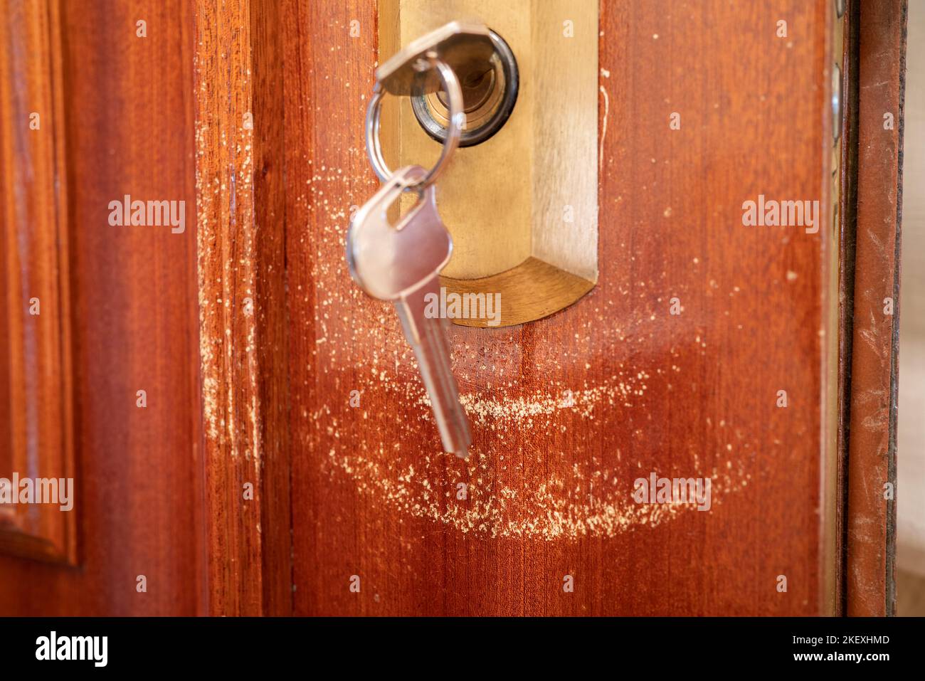 Close up of an external lock on a door scratched by keys Stock Photo ...