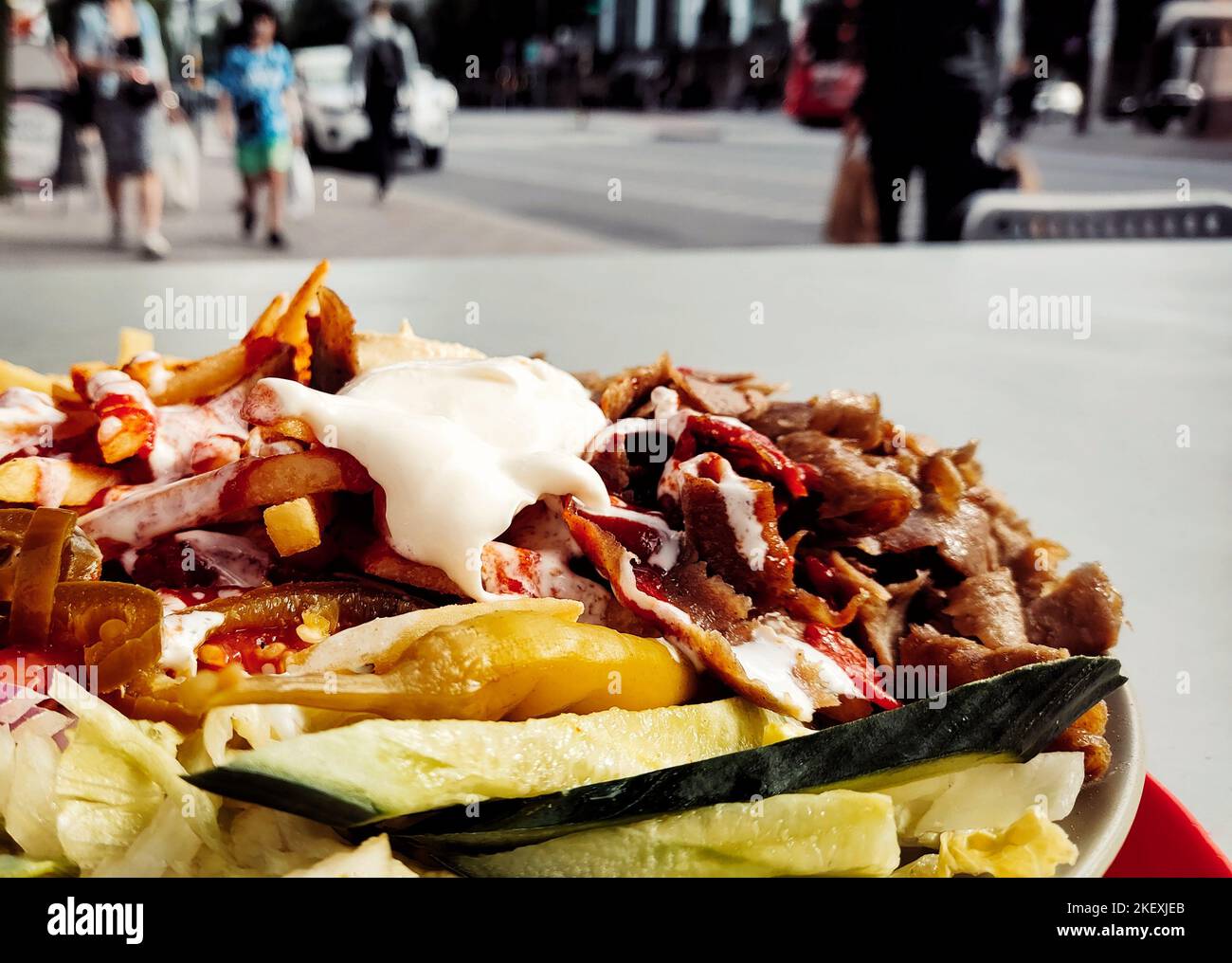 a plate of fast food at outdoor restaurant Stock Photo - Alamy