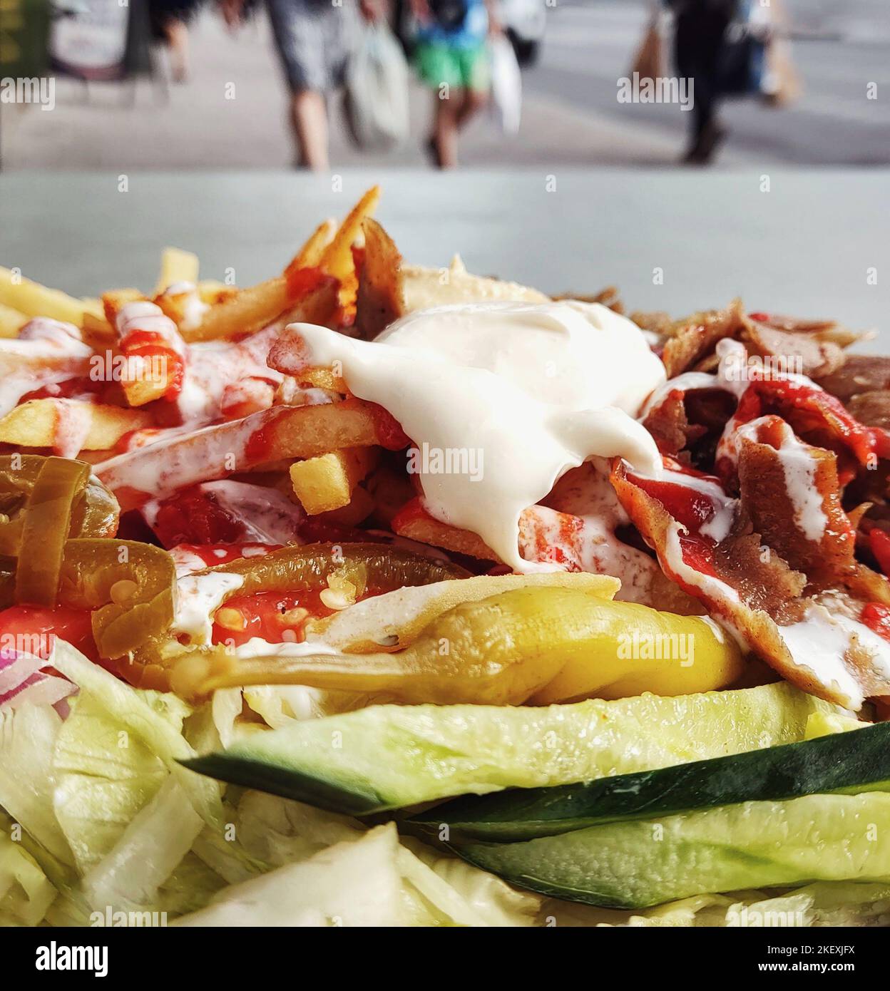 a plate of fast food at outdoor restaurant Stock Photo - Alamy