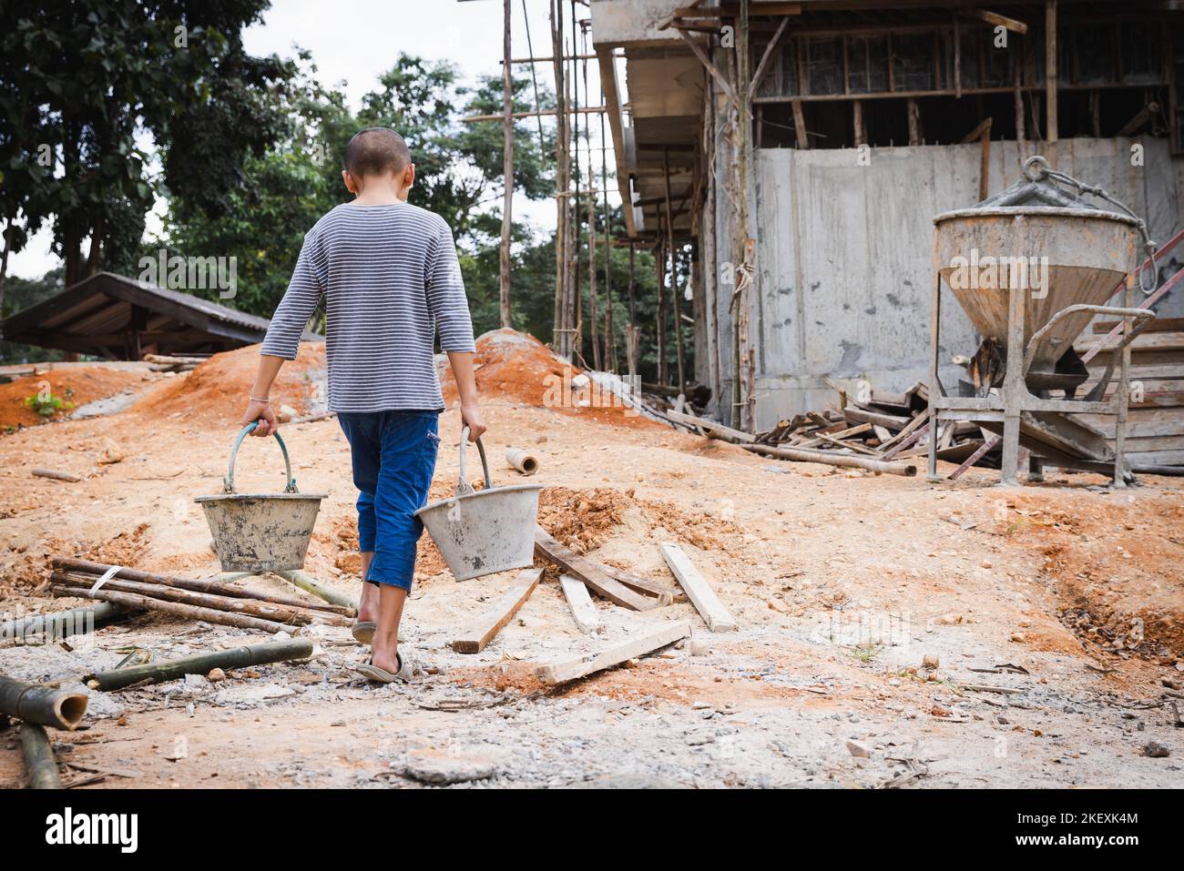 Concept of child labor, Children working at construction site for world ...