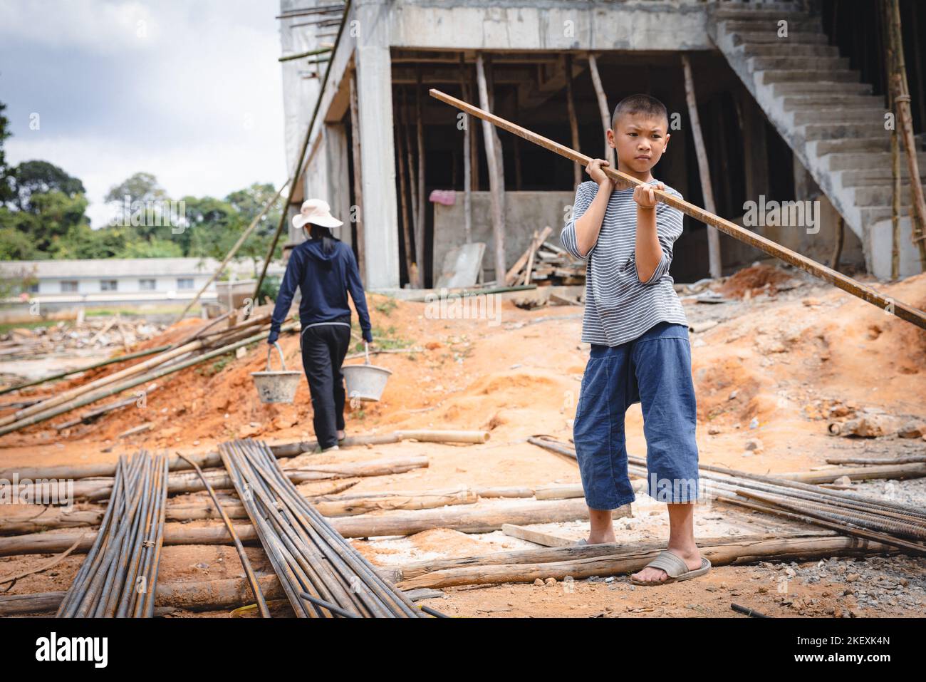 Concept of child labor, Children working at construction site for world ...