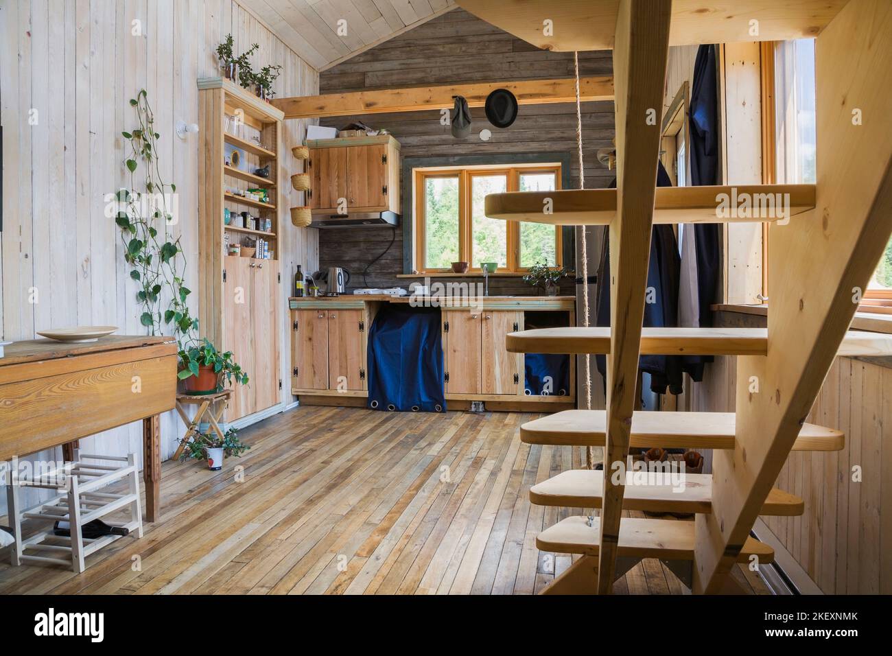 Retractable pine wood stairs, folding dining table and kitchen area ...