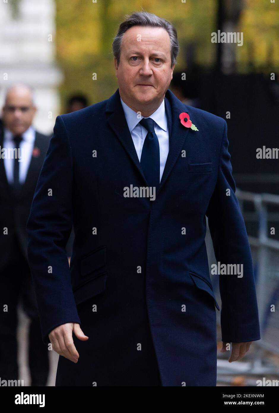 David Cameron walks through Downing Street to attend the Remembrance ...