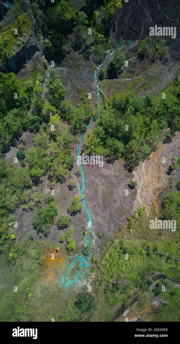 Copper waste in water run off at Panguna open Pit Mine Stock Photo - Alamy