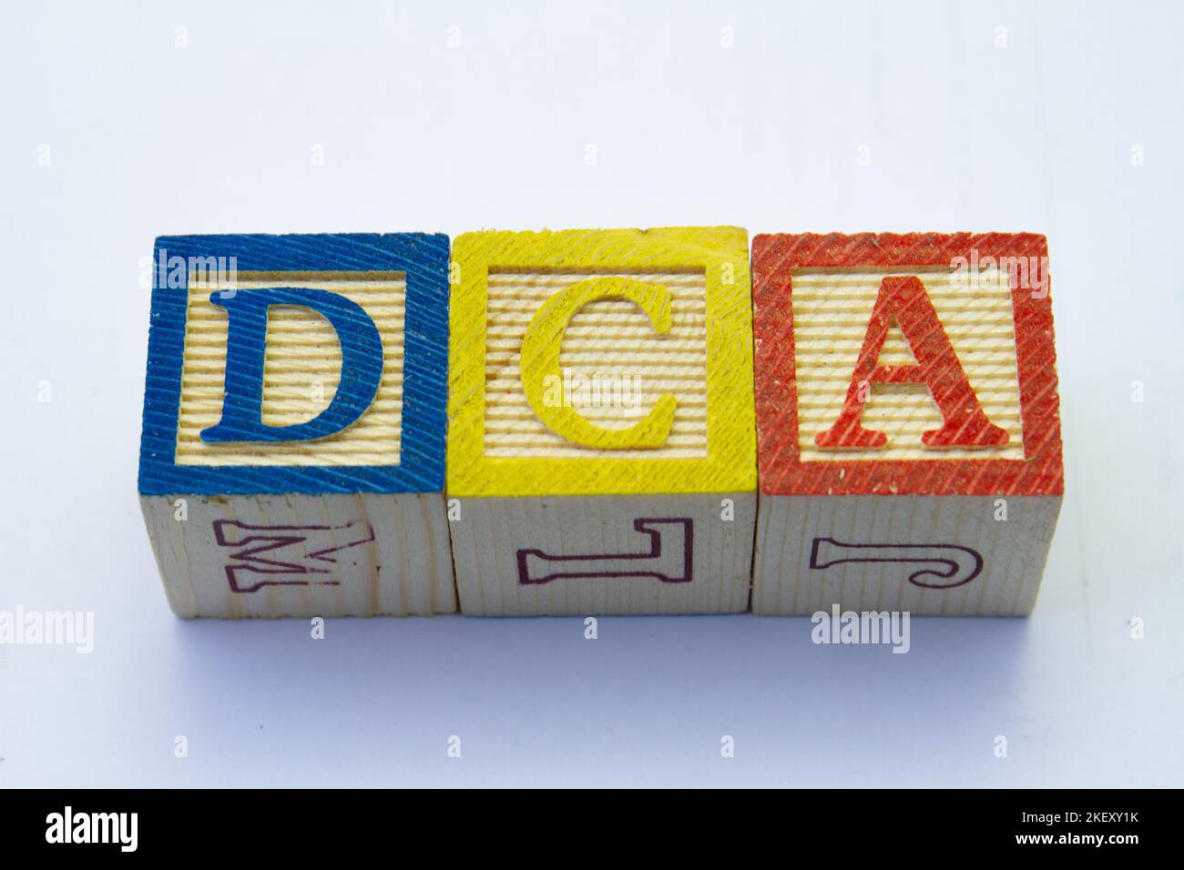 The term DCA visually displayed on a clear background with copy space ...