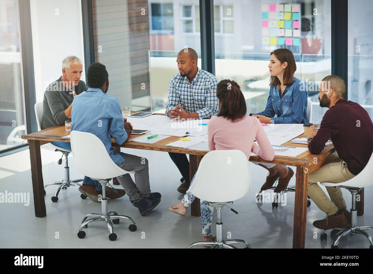 Discussing some designs. Full length shot of a group of architects ...