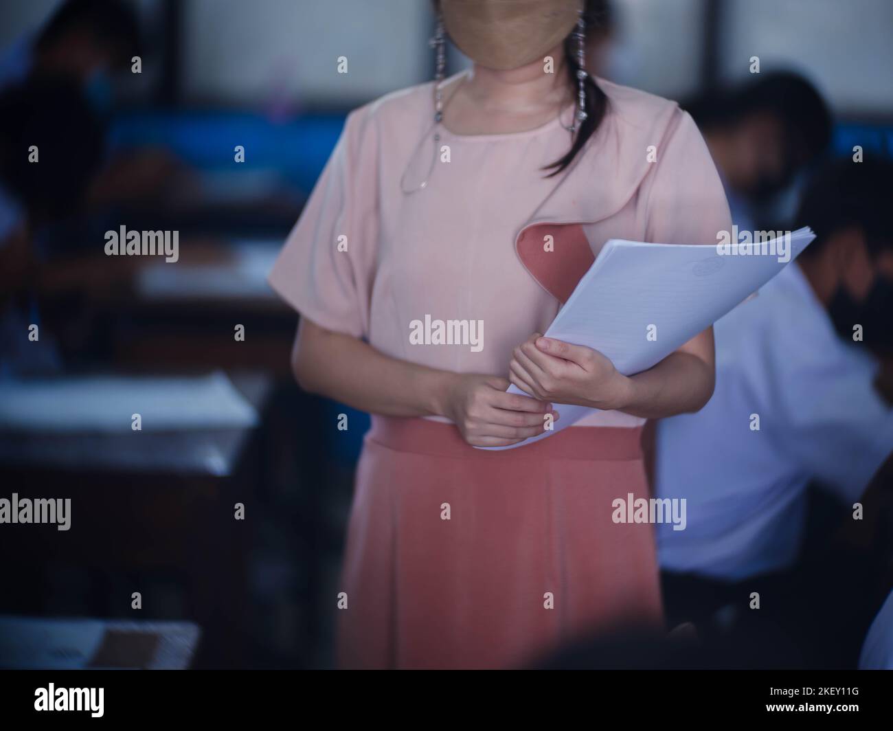 Teacher controls the exam room for students to take the exam in the ...