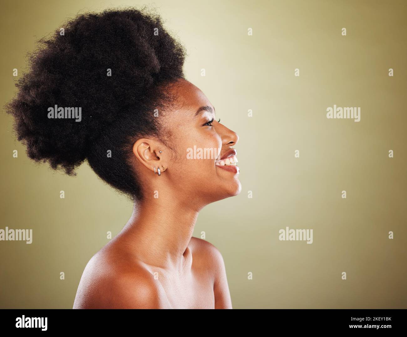 Black woman, hair and afro in studio with smile, beauty and wellness ...