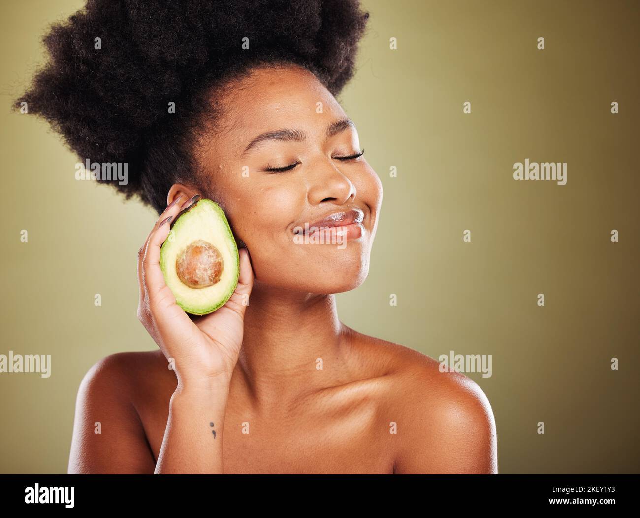 Face, skincare and black woman with avocado for health, wellness and ...