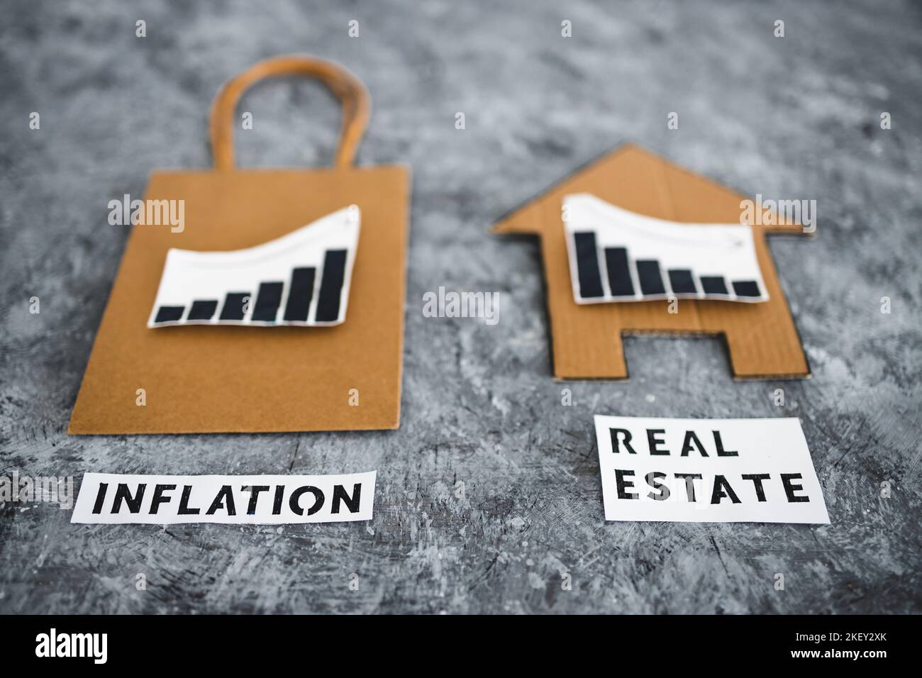 inflation going up and real estate value dropping conceptual image ...