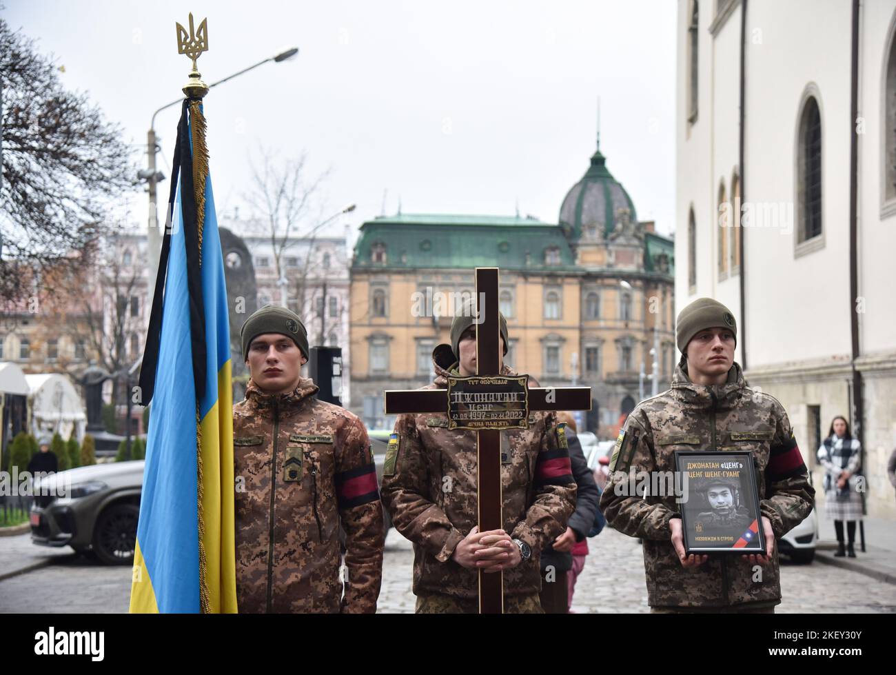 Lviv, Ukraine - 14 Nov 2022, A soldier holds a portrait of Tseng Sheng ...
