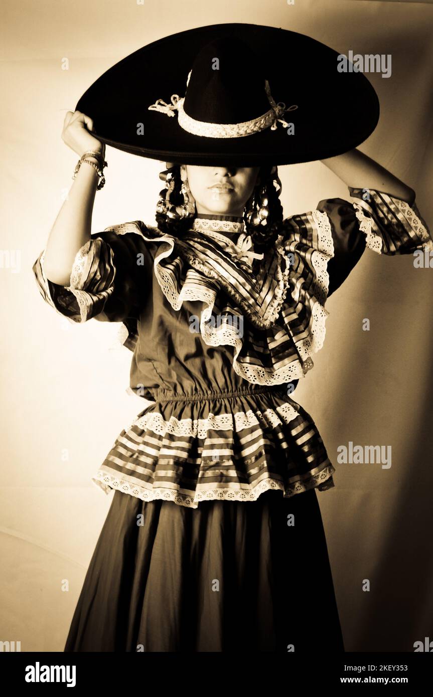 Portrait of a teen women wearing traditional Adelita costume, Mexican ... Portrait of a teen women wearing traditional Adelita costume, Mexican ...
