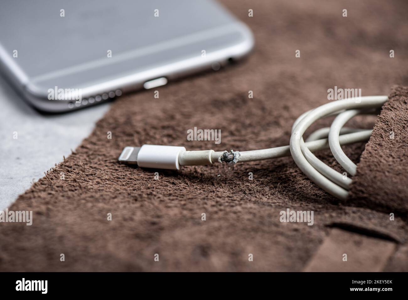 Broken phone charger cable hi-res stock photography and images - Alamy