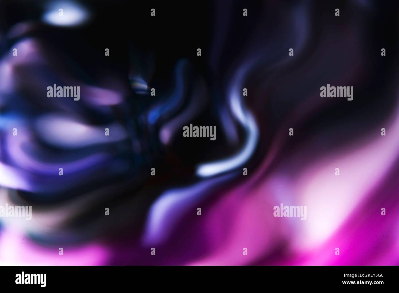 defocused neon glow light flare purple blue dark Stock Photo - Alamy