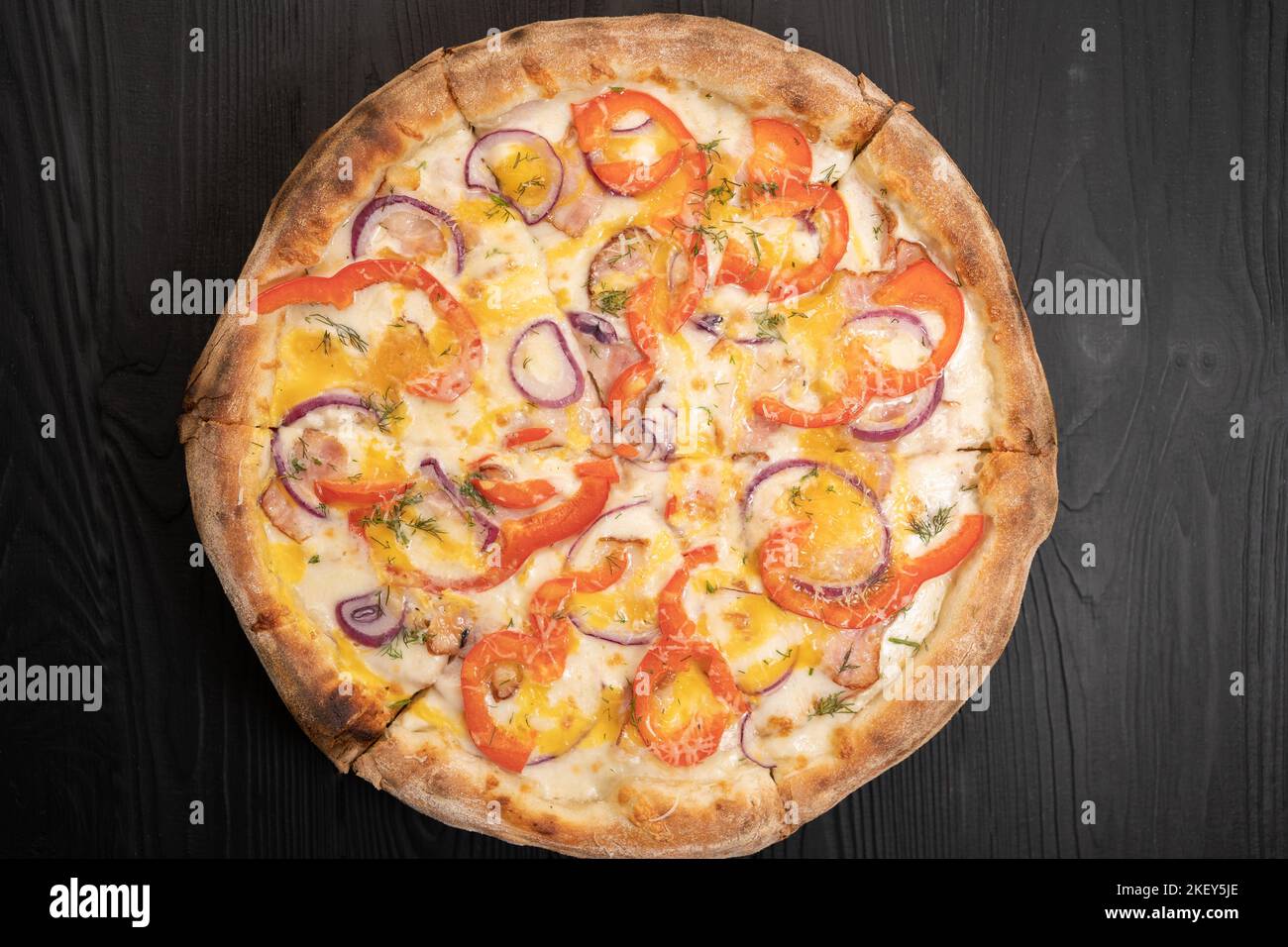 Delicious fresh pizza with vegetables served on dark background. Top ...