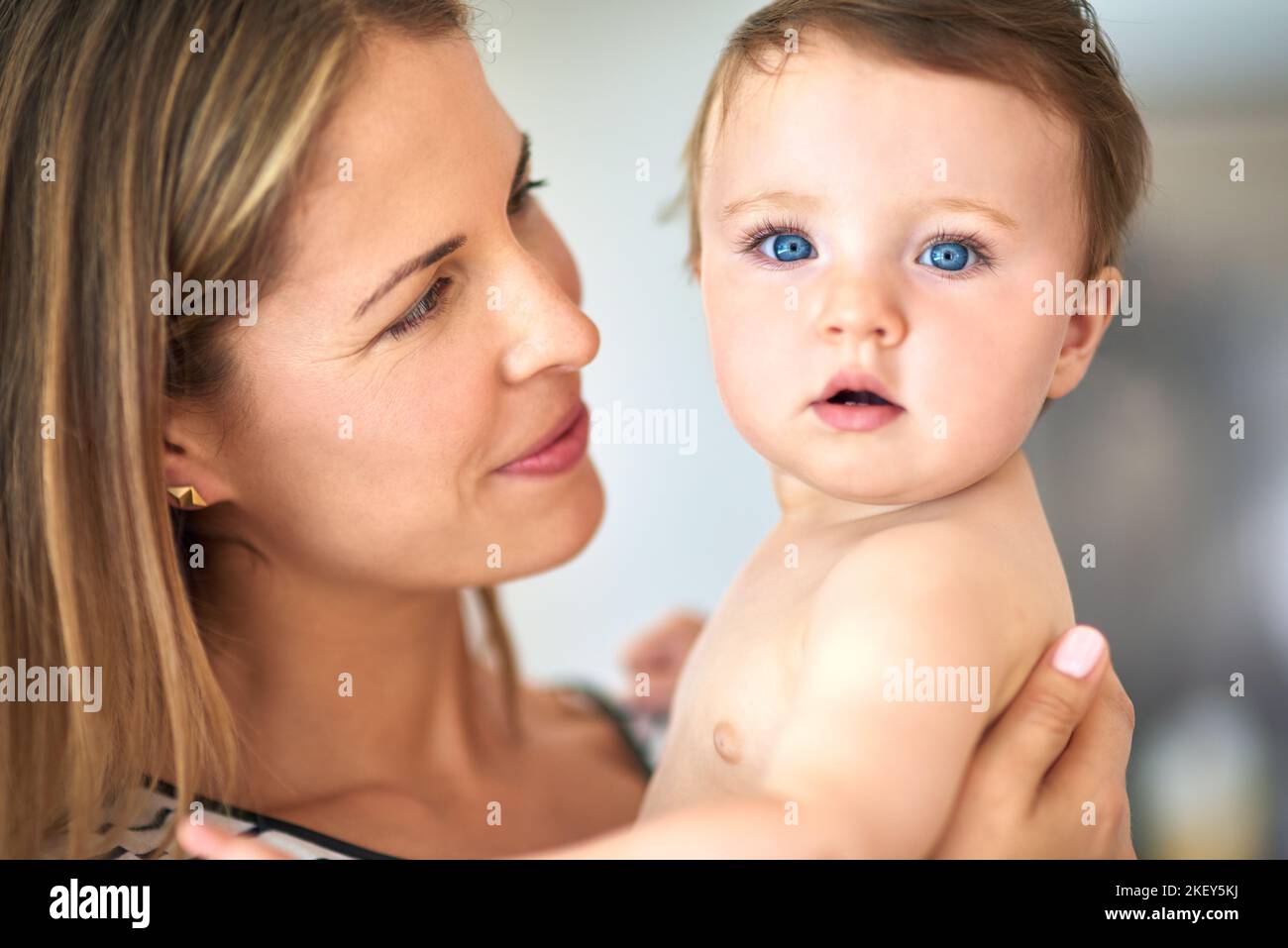 Mother carrying baby girl hi-res stock photography and images - Alamy Mother carrying baby girl hi-res stock photography and images - Alamy