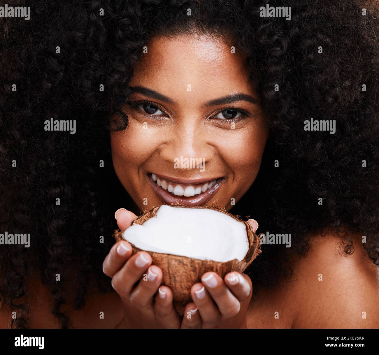 Beauty, portrait and woman holding coconut for organic skincare ...