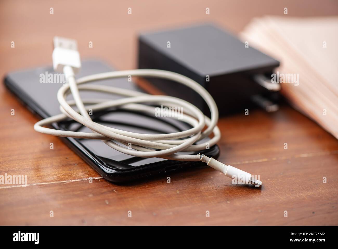 Broken phone charger cable hi-res stock photography and images - Alamy