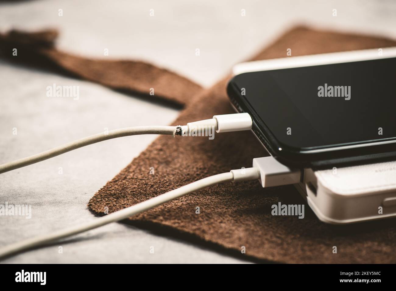 Broken phone charger cable hi-res stock photography and images - Alamy